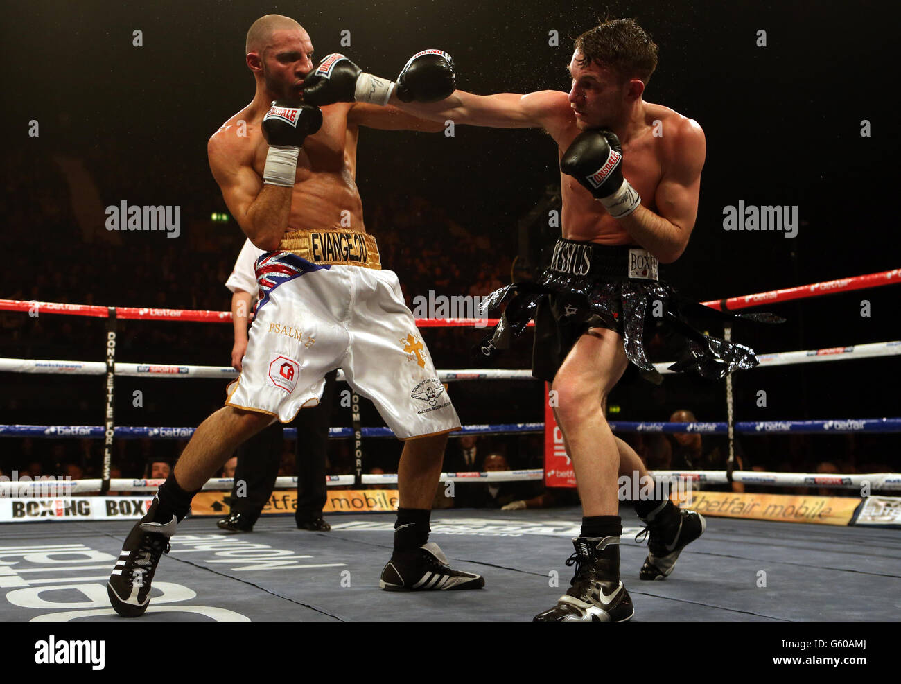 Danny Cassius Connor (right) in action with Chris Evangelou before ...