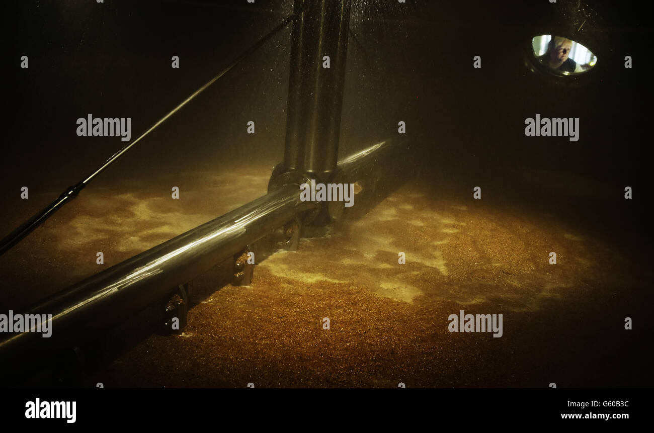 Lead tour guide Jennifer Macintyre is picture in a window of a Mash Tun ...