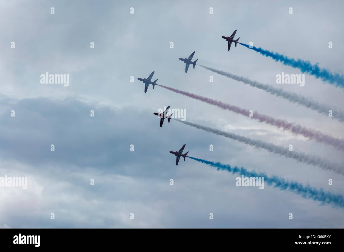 RAF Red Arrow Hawk Jets flying in formation in the sky Stock Photo - Alamy