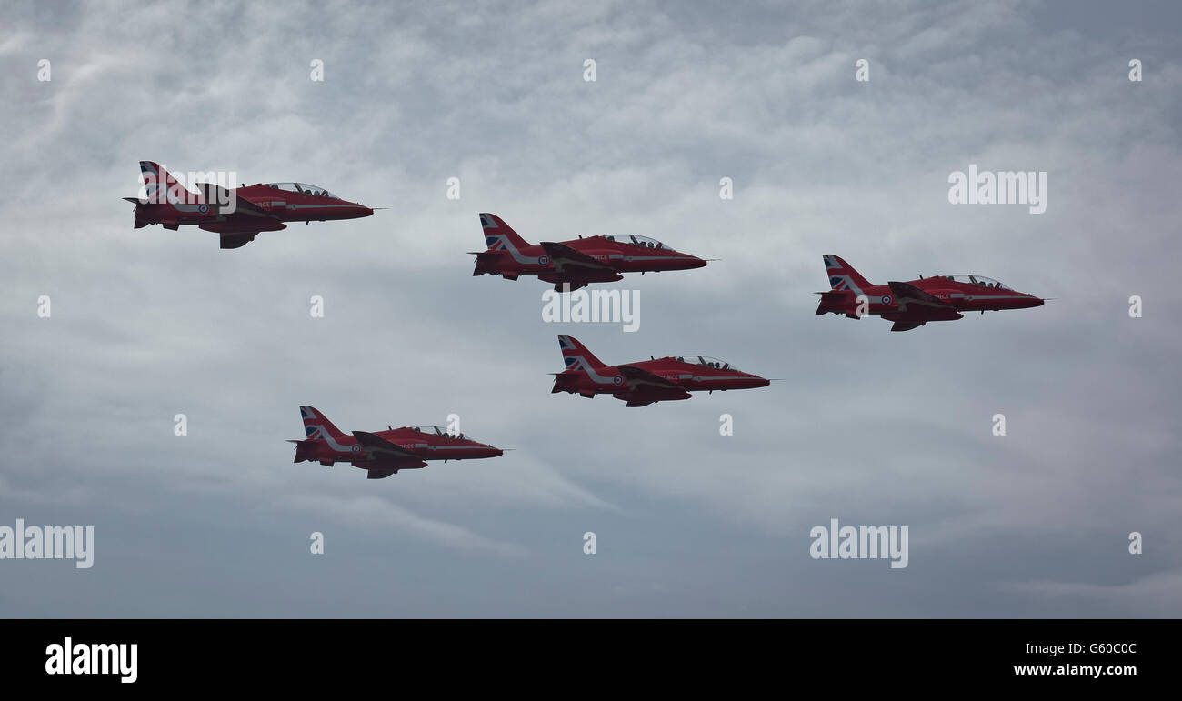RAF Red Arrows Hawk Jets in Formation in the sky Stock Photo - Alamy