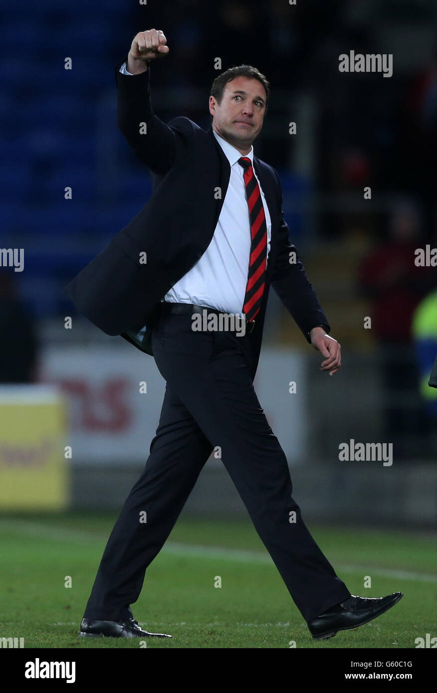 Cardiff City's Manager Malky Mackay celebrates with fans after later ...