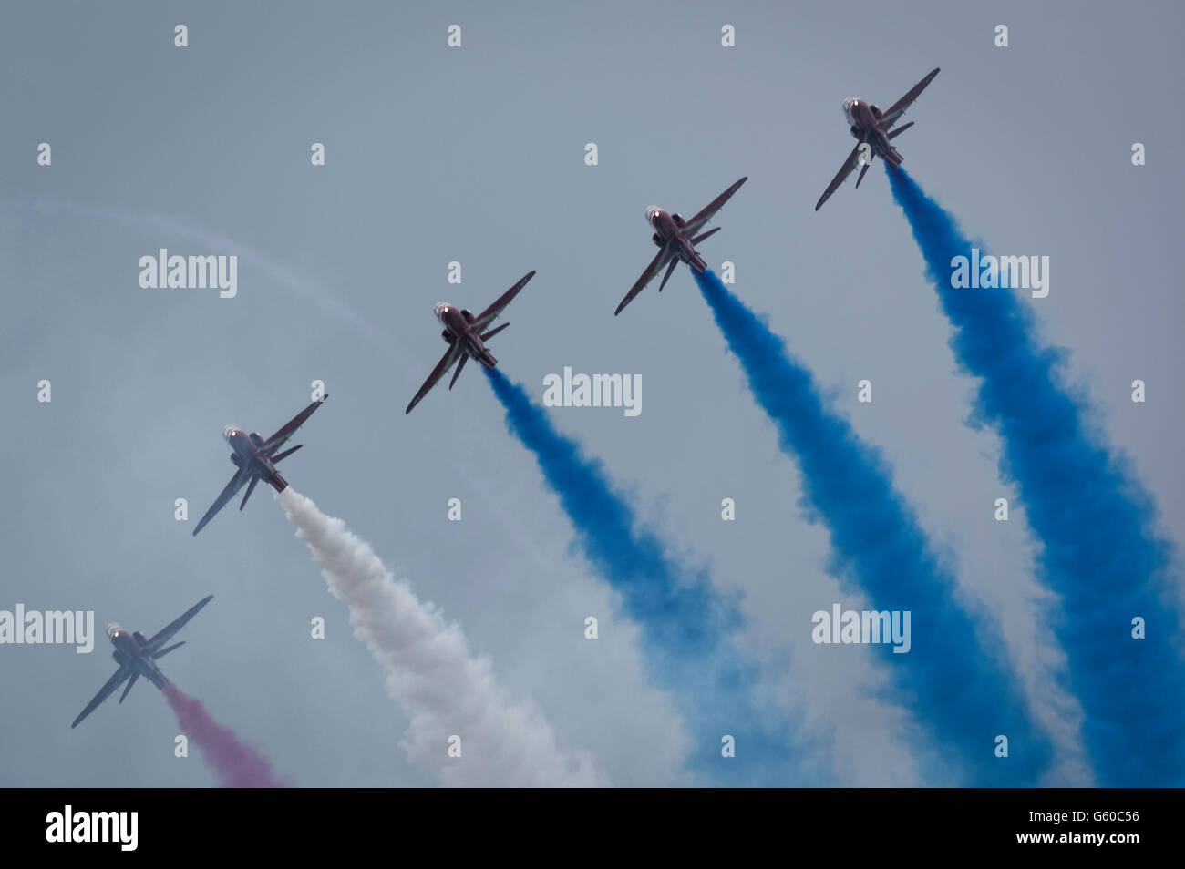 RAF Red Arrows Hawk Jets in aerobatic formation in the sky Stock Photo ...