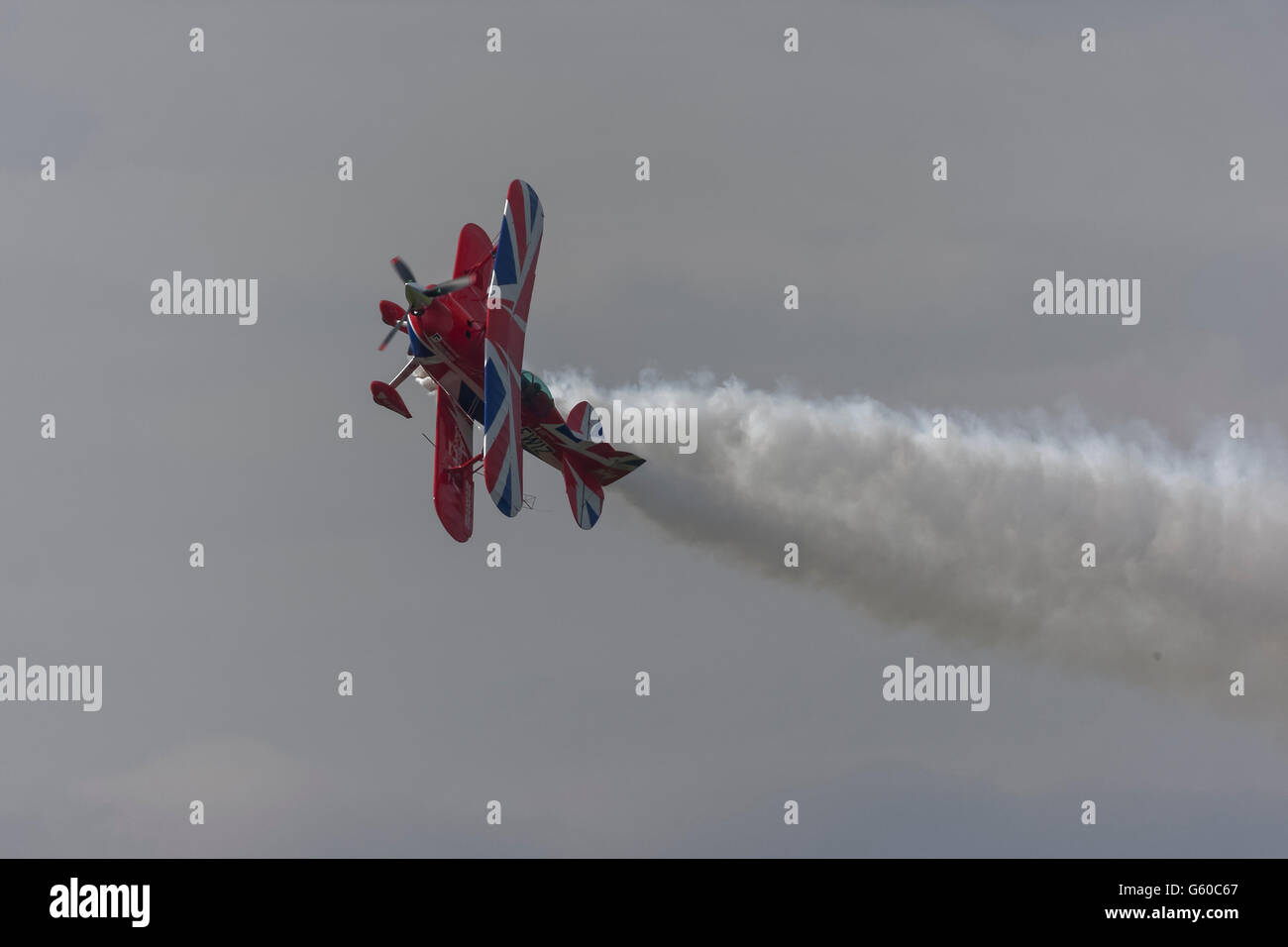 Red Pitts Special S2S biplane doing aerobatics in the sky with Union ...