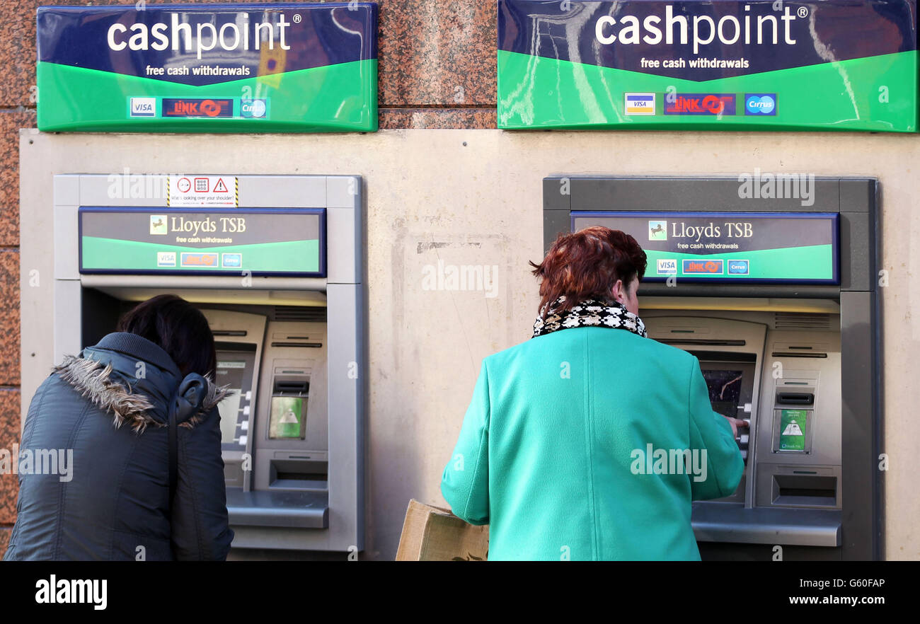 General view of money being taken out of cash machine hi-res stock ...
