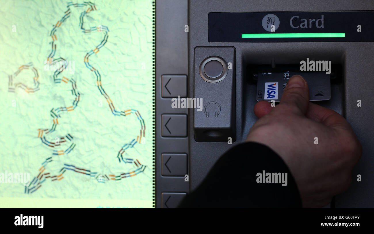 Money stock. General view of money being taken out of a cash machine ...