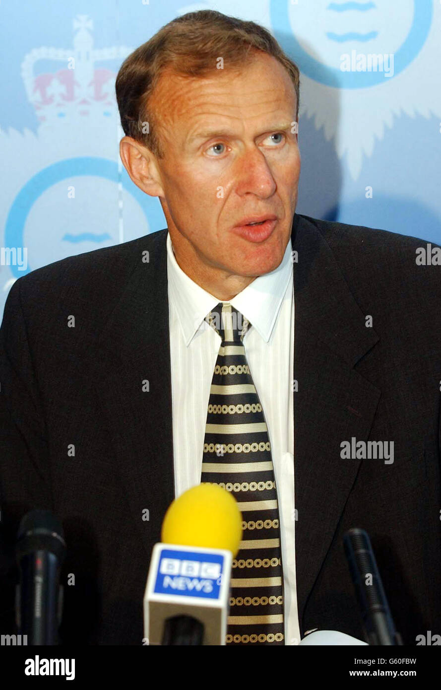 Detective Superintendent David Hankins answers questions from the media ...