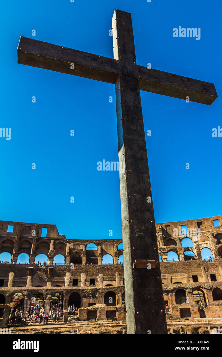 Cross in the colosseum in Rome Stock Photo - Alamy