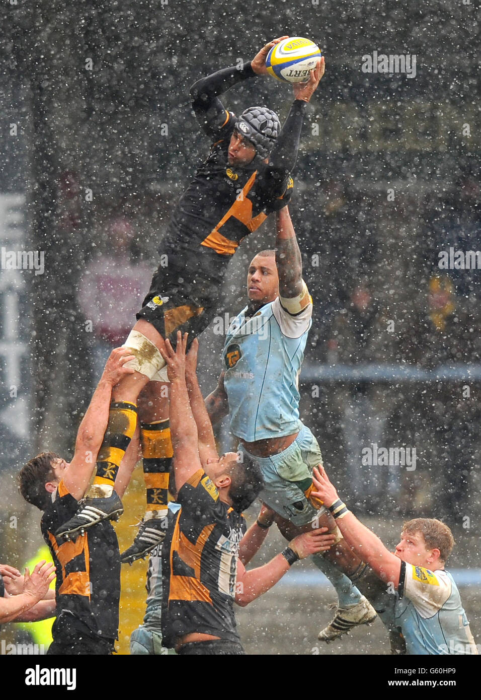 London Wasps' Marco Wentzel leaps above Northampton Saints' Courtney ...