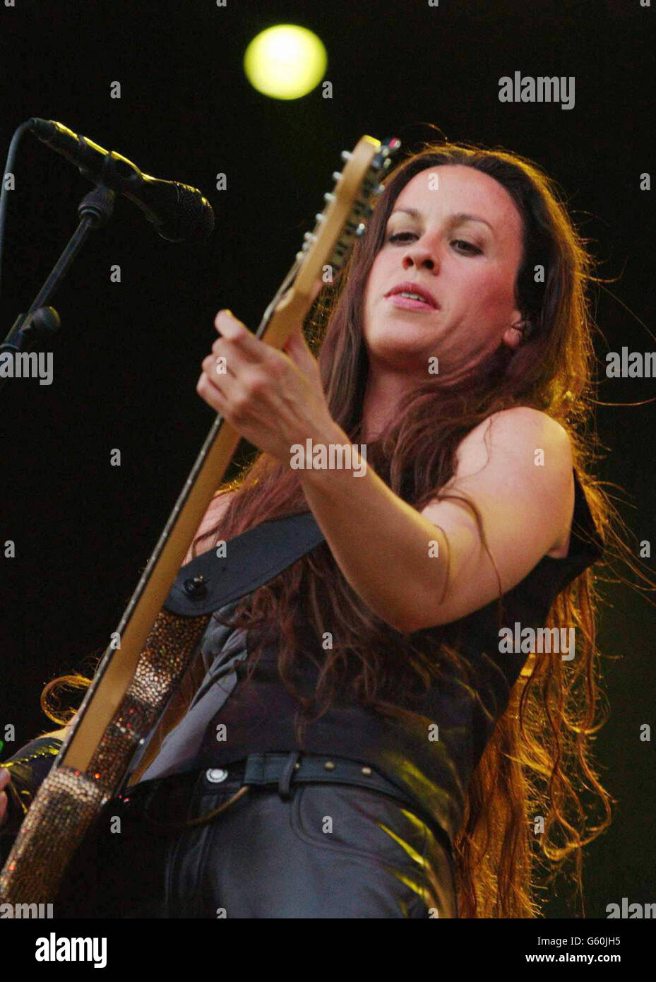 Canadian rock singer Alanis Morissette performing on the V Stage, on ...