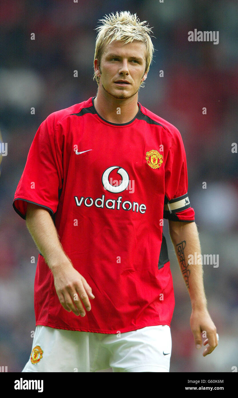 Manchester United player David Beckham in action against Boca Juniors ...
