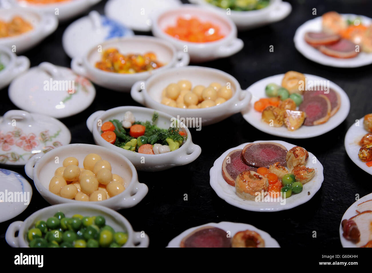 Miniature plates of food on display during Miniatura 2013 - The ...
