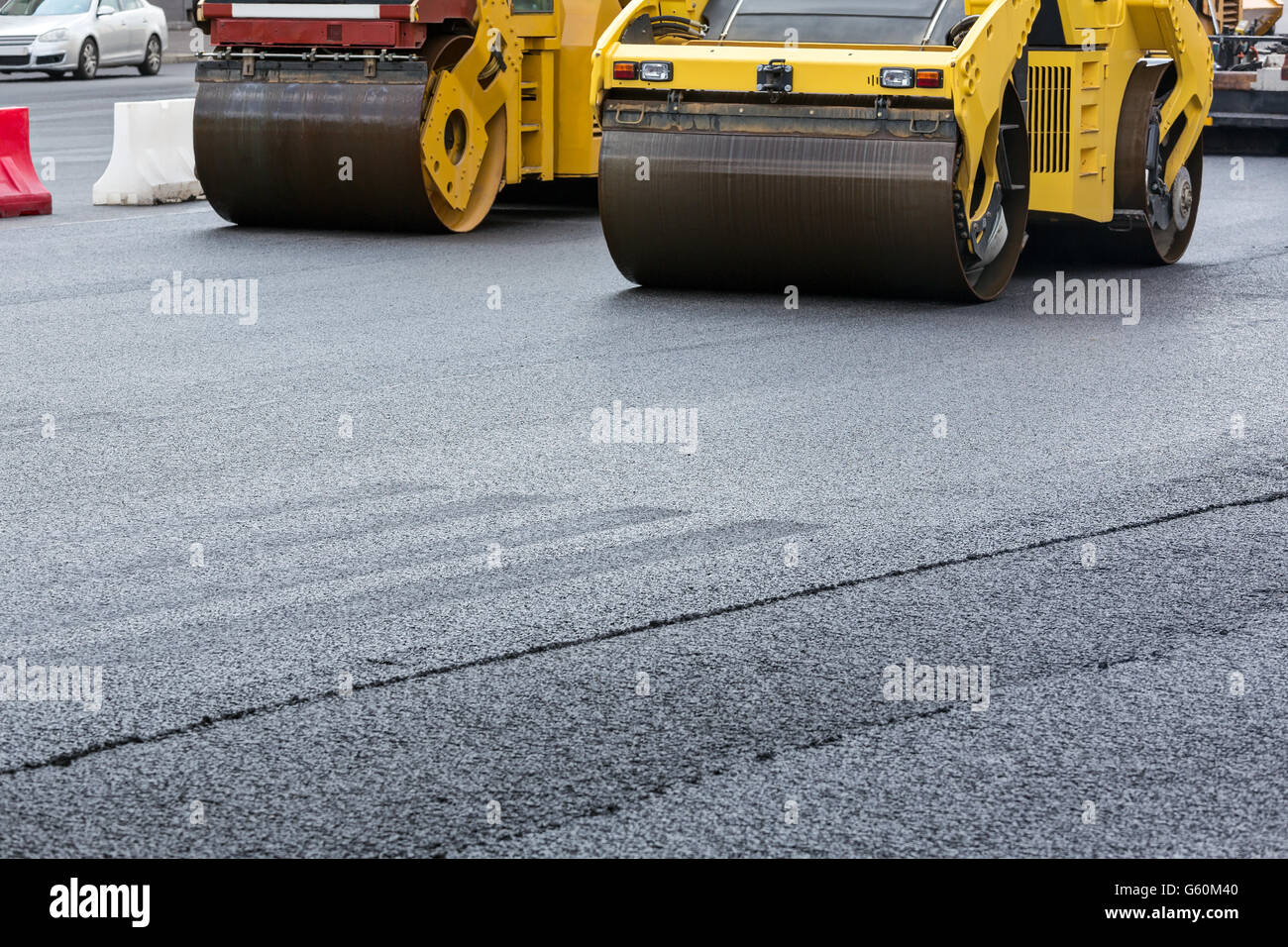 Heavy steam rollers during asphalt pavement works Stock Photo - Alamy