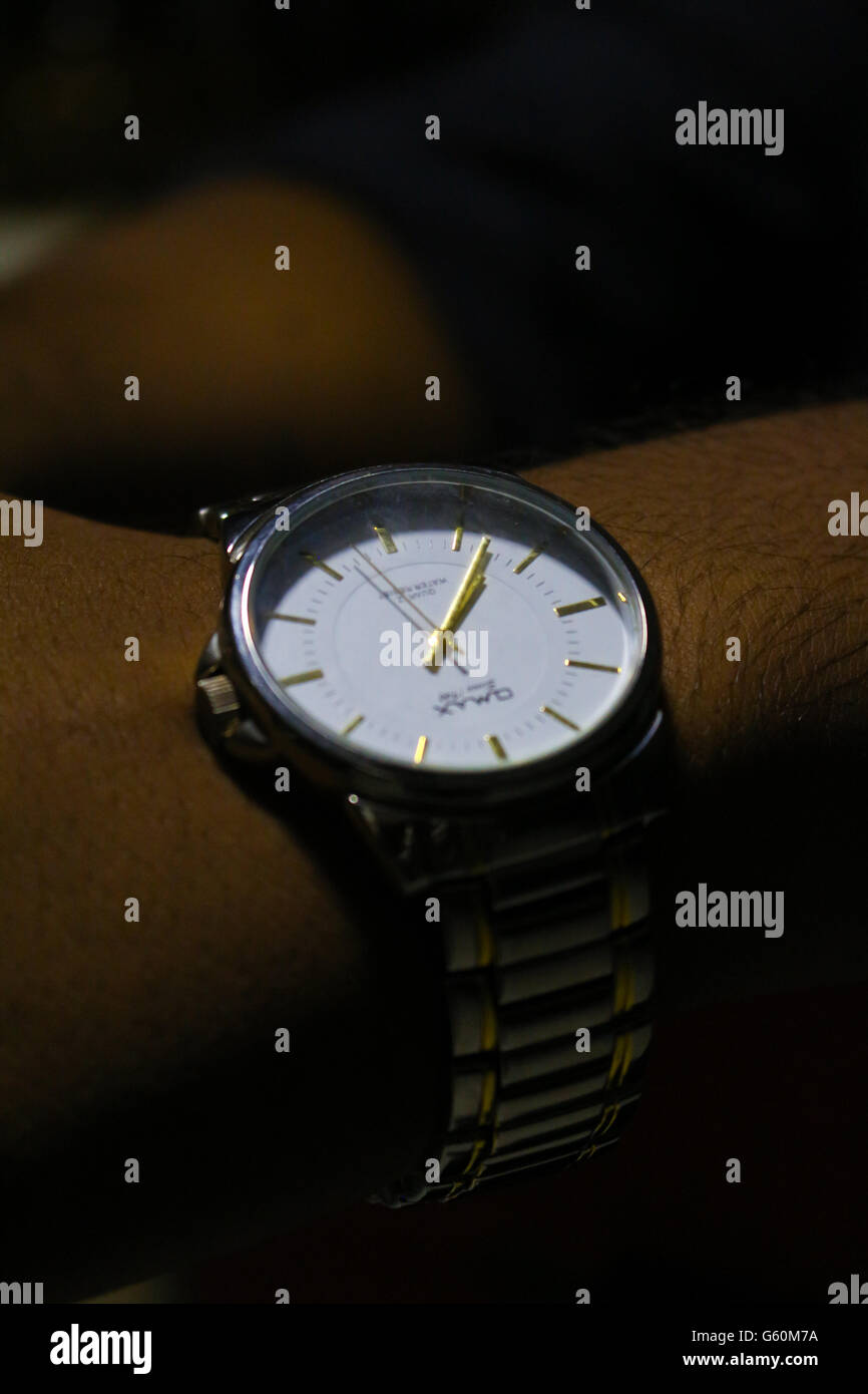 Wearing wrist watch hi-res stock photography and images - Alamy