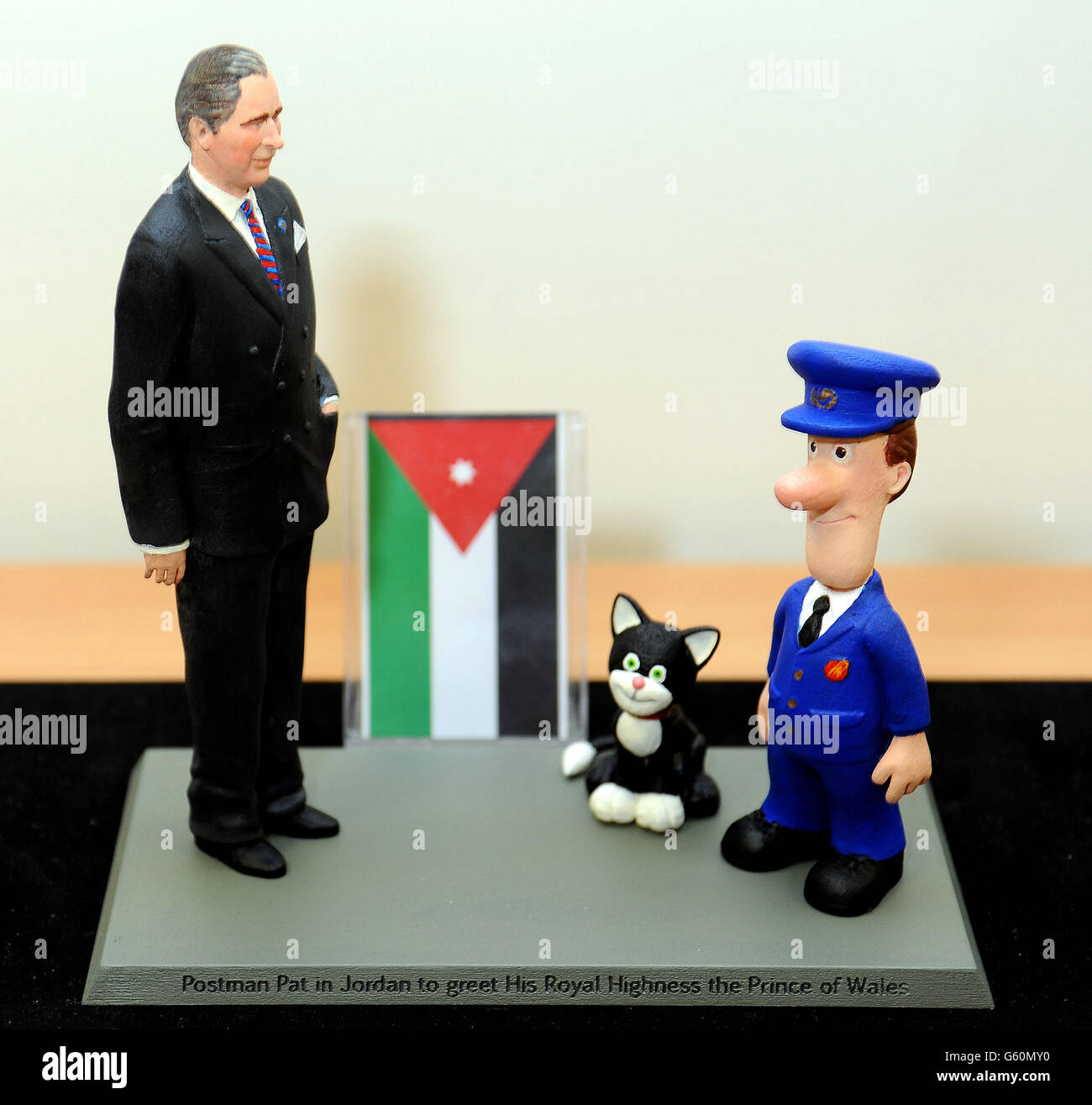 A model of himself with Postman Pat and his black and white cat that ...