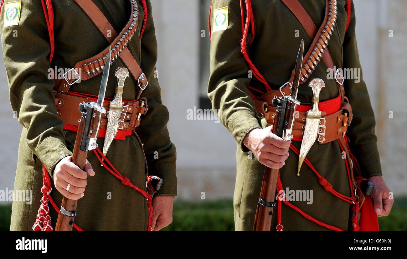 A pair of Jordanian soldiers with their traditional daggers, rifles and ...