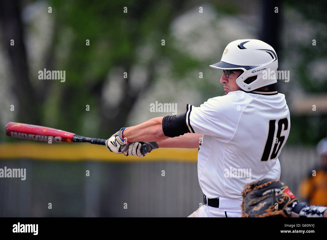 Closeup of baseball player hitting ball hi-res stock photography and ...