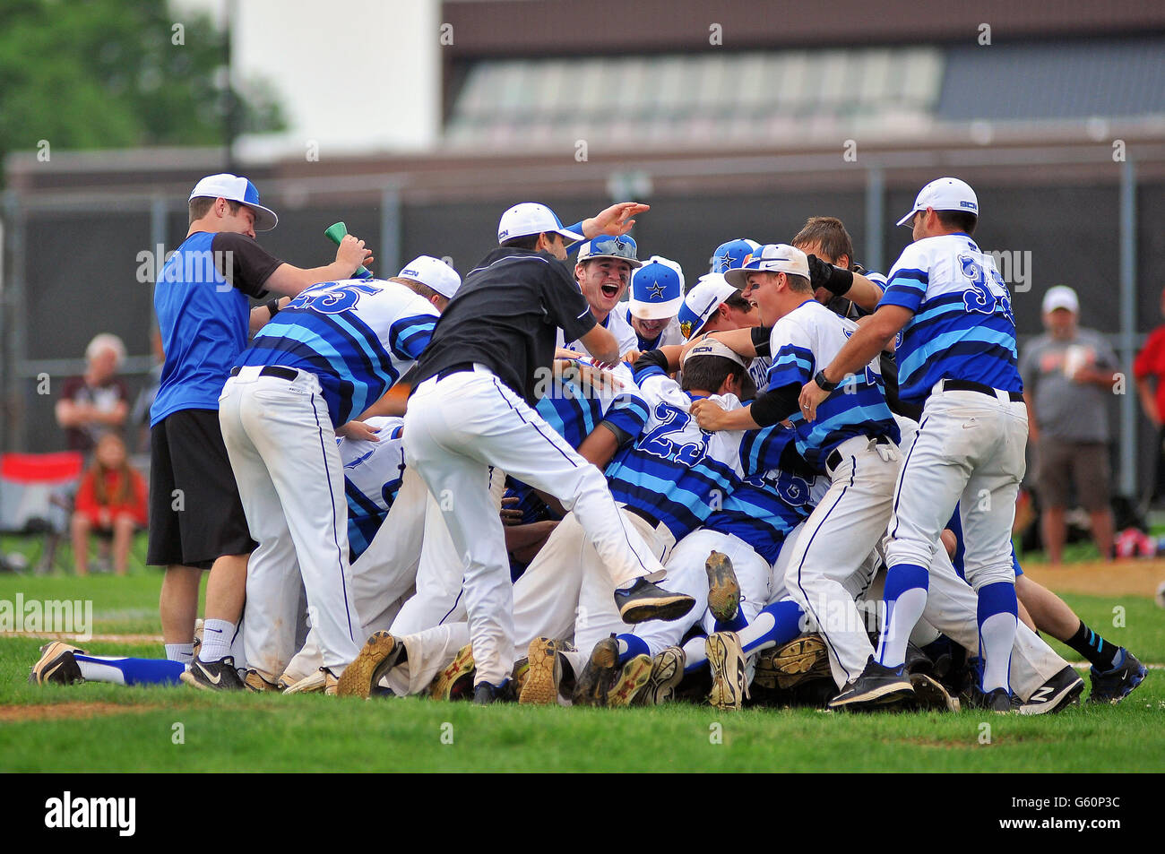 Players form a human pile near the pitcher's mound following the final ...