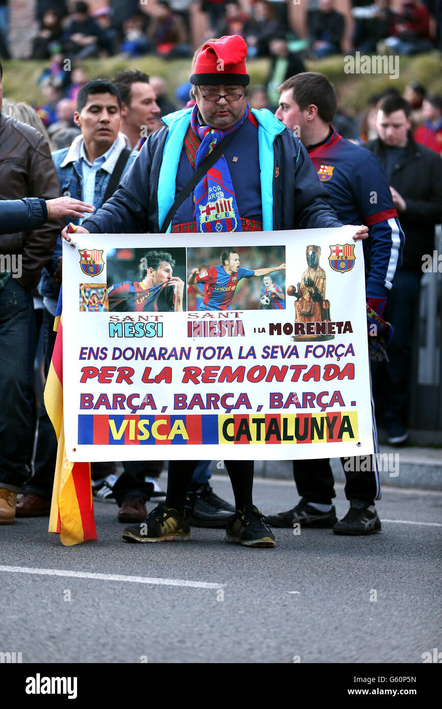 Barcelona fans soak up the atmosphere outside the Nou Camp Stadium ...