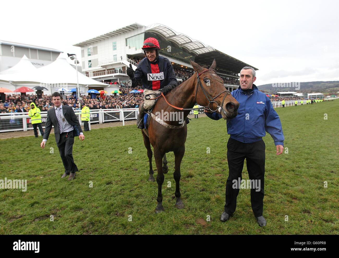 Jockey Barry Geraghty celebrates after winning the Betfred Cheltenham ...