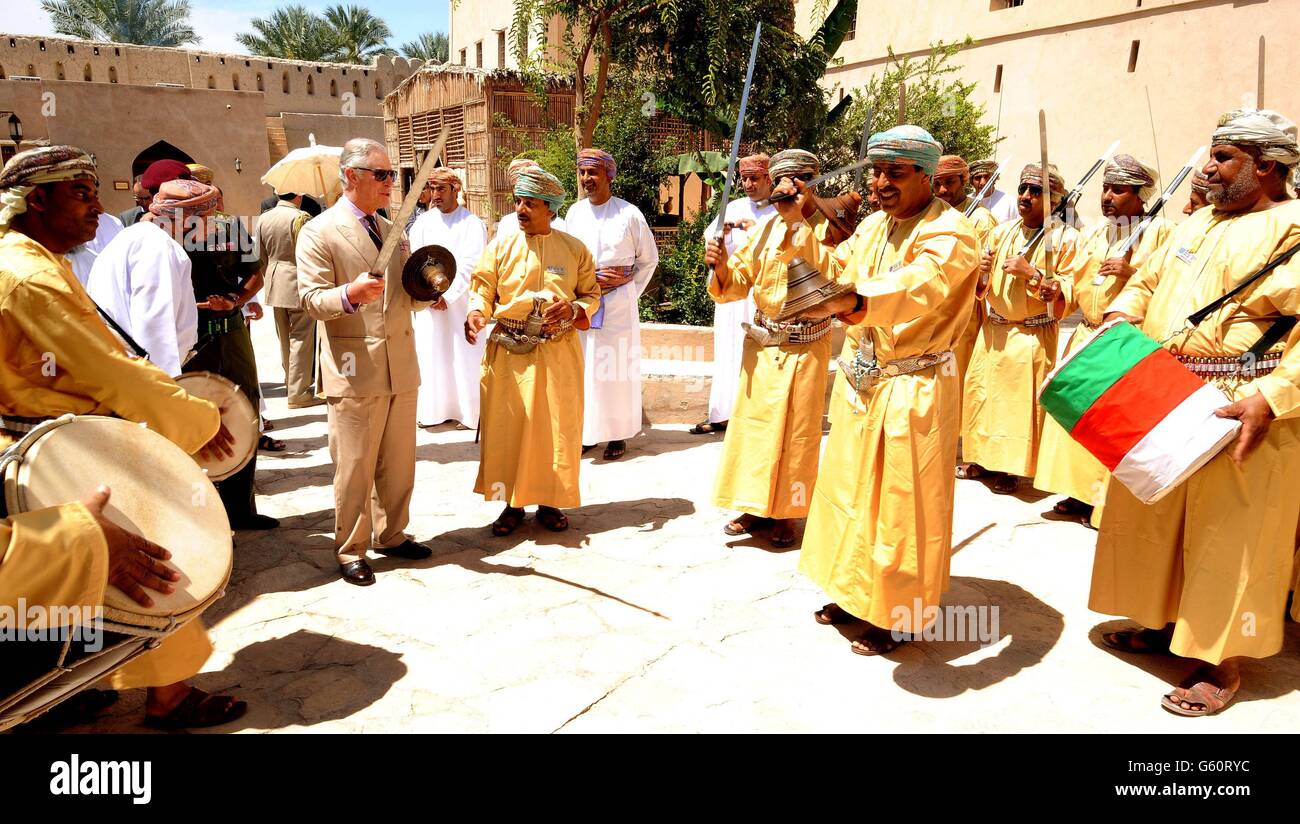 The Prince of Wales is given an Omani sword and shield by a traditional ...