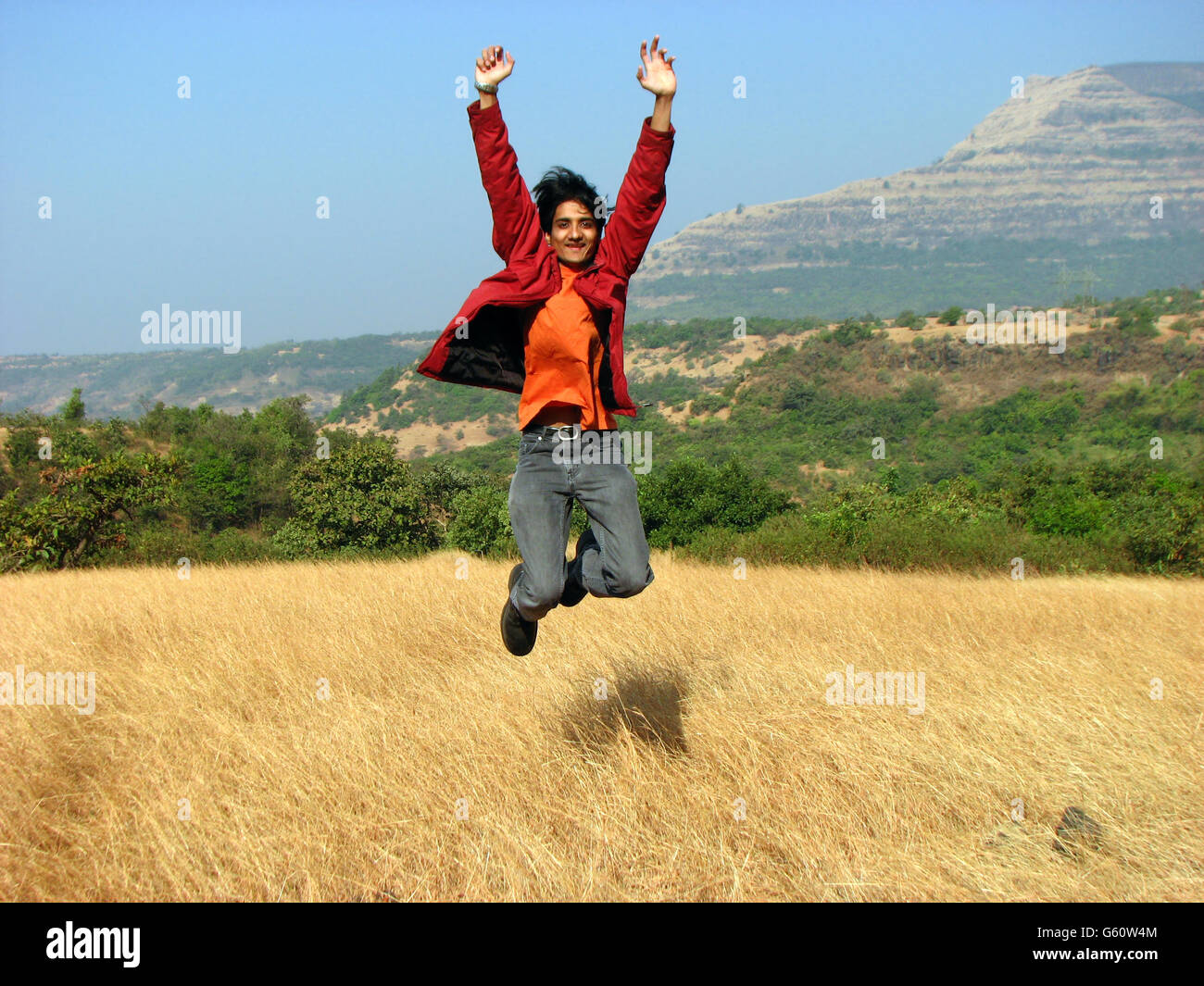 Jumping with joy Stock Photo - Alamy
