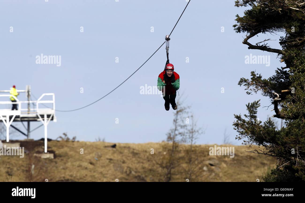 A man 9name not given) goes down the zip wire at Zip World in Penrhyn ...