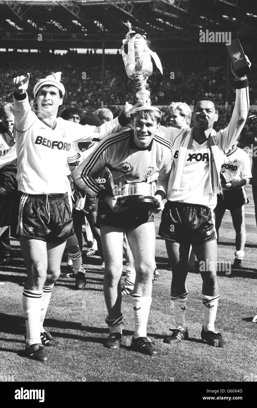 Luton Town captain Steve Foster (l) and two goal scorer Brian Stein (r ...
