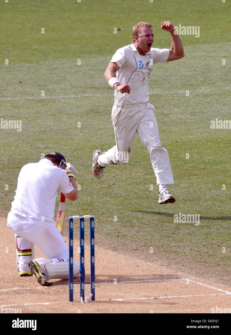 New Zealand's Neil Wagner (right) celebrates taking the wicket of ...