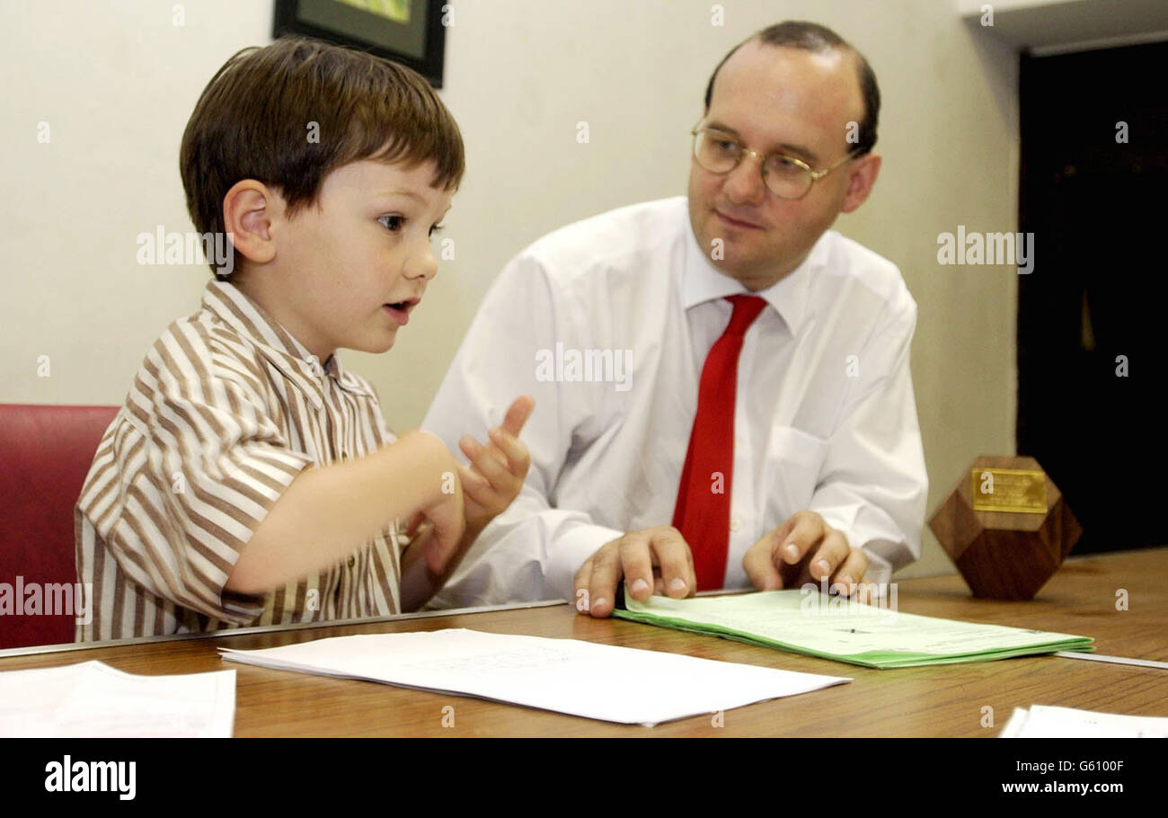 Arran Fernandez, aged 7 from Surrey, plays on a Comptometer (a 1920's ...