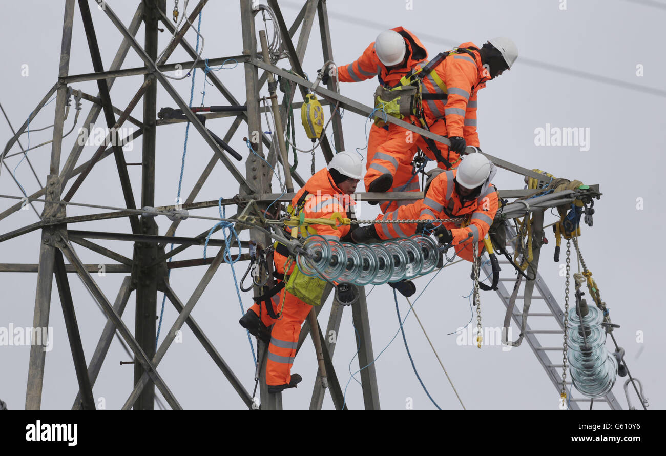 Workers pictured on damaged pylon in kintyre hi-res stock photography ...