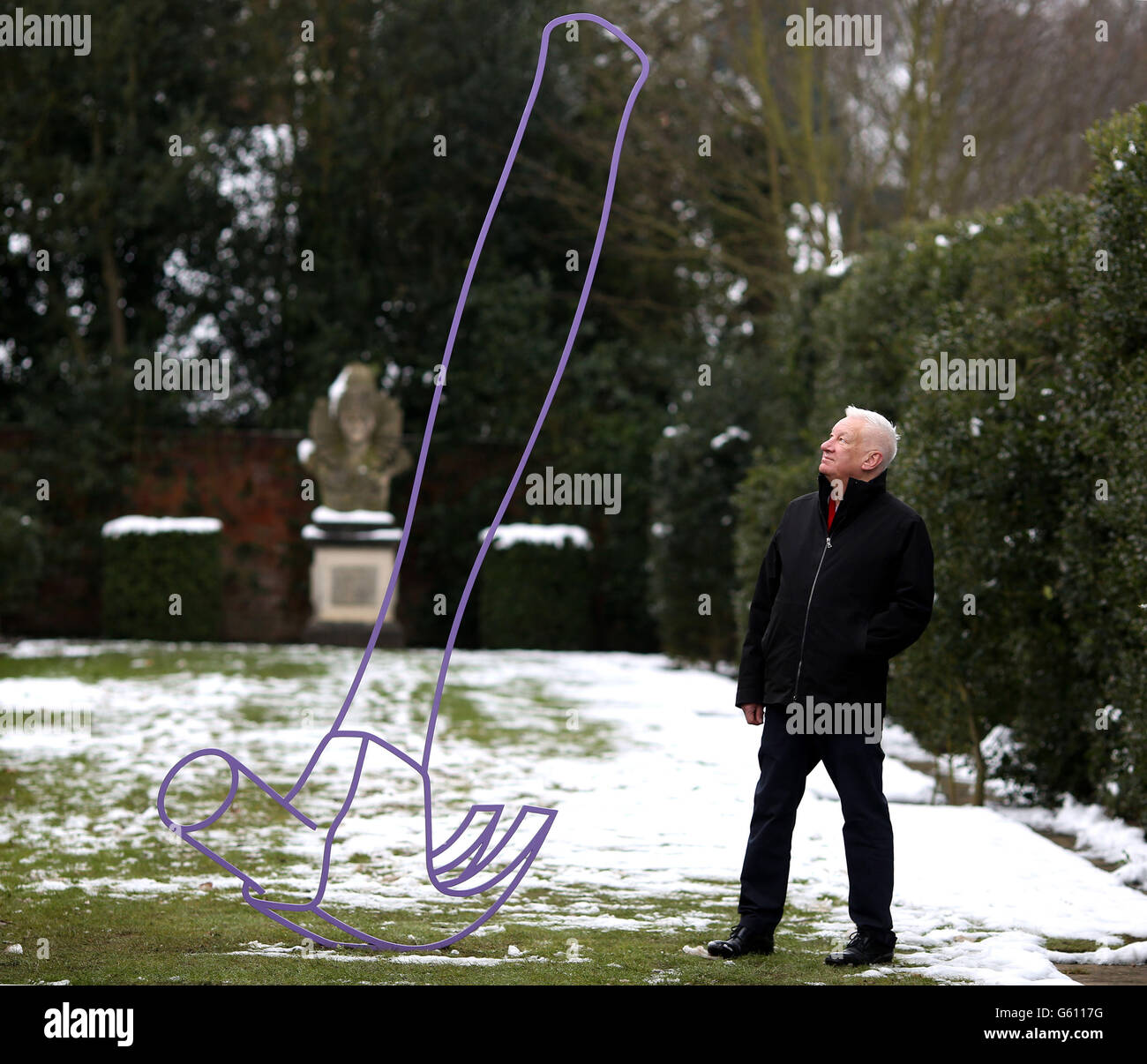 Artist and Sculptor Michael Craig-Martin RA stands with his work Hammer ...