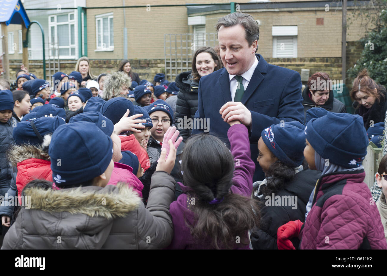 Prime Minister David Cameron, meets children during a visit to ...