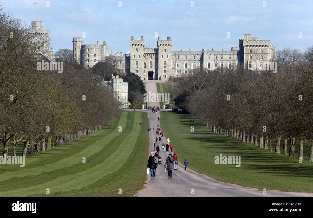 People walk along the Long Walk near Windsor Castle in Berkshire in the ...