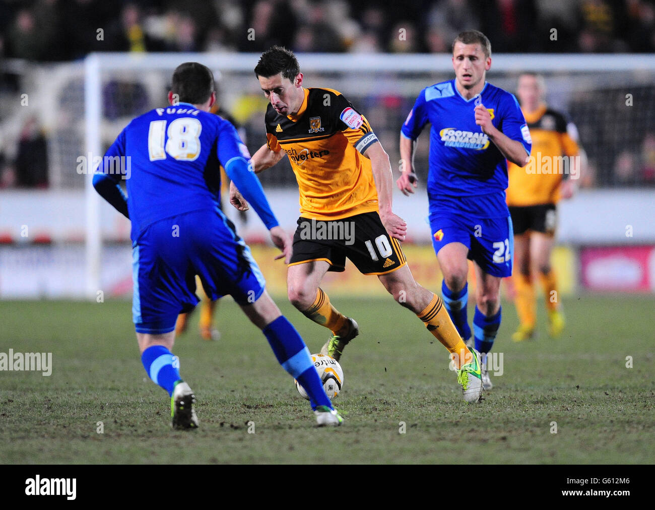 Hull City's Robert Koren takes on Watford's Daniel Pudil (left) during ...
