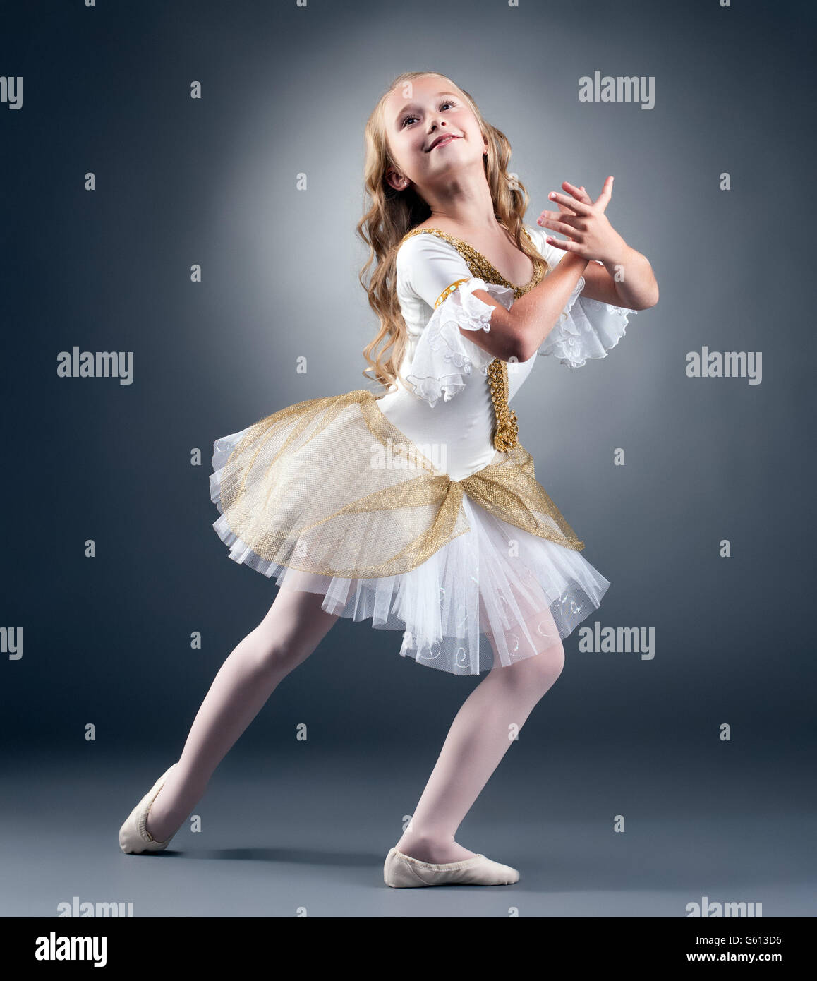 Studio shot of graceful little ballet dancer Stock Photo - Alamy