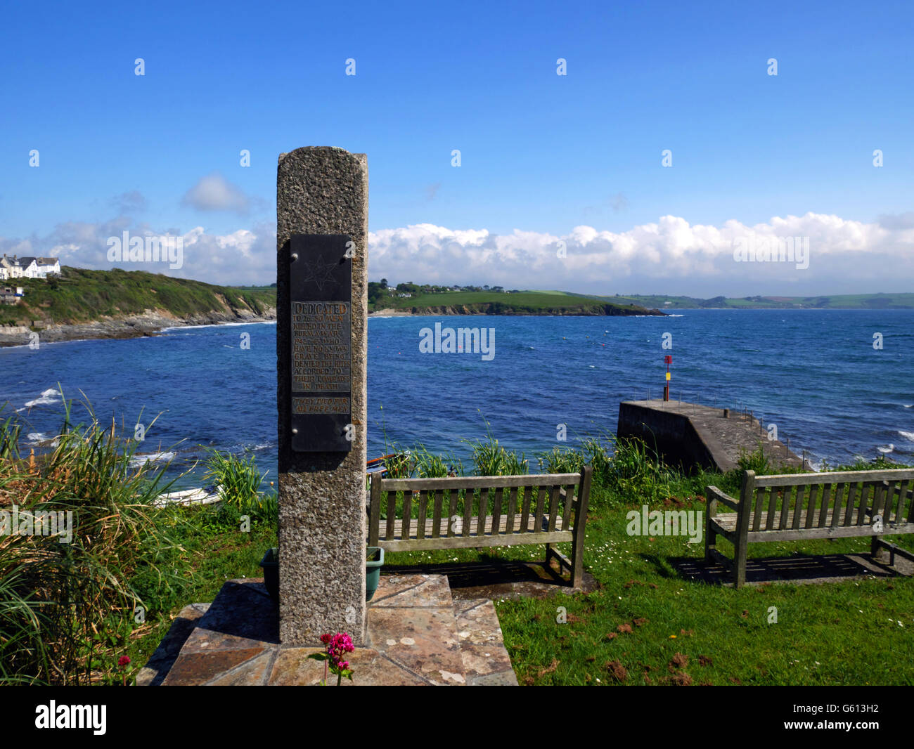 A granite memorial pillar to Burma War dead overlooking the harbour at ...