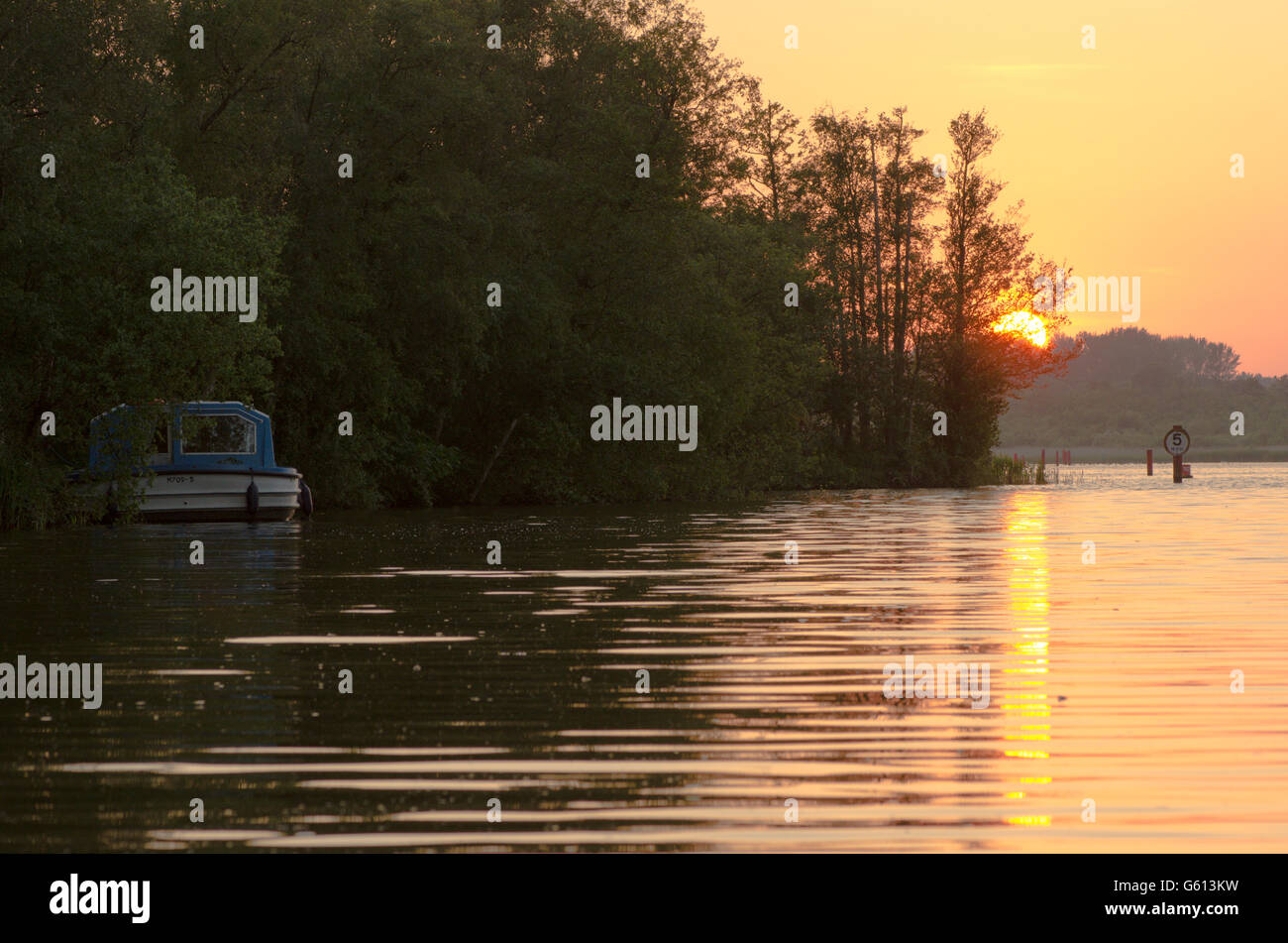 Sunset, twilight, over Barton Broad, from the southern exit to the ...