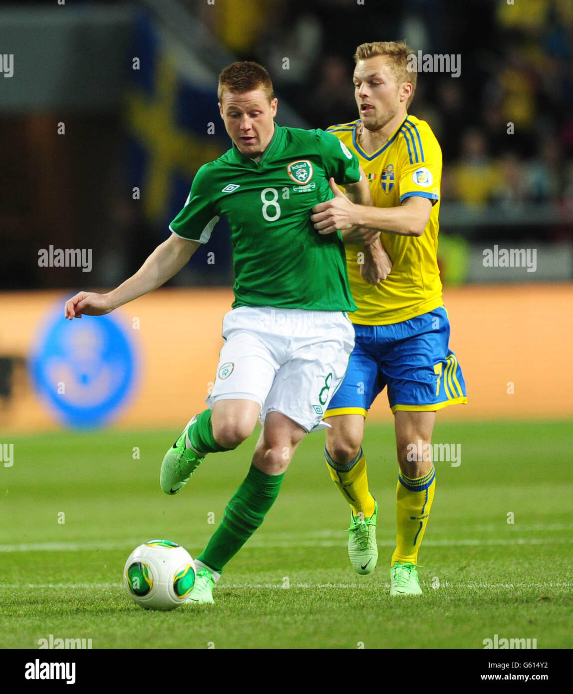Sweden's Sebastian Larsson and Republic of Ireland's James McCarthy ...