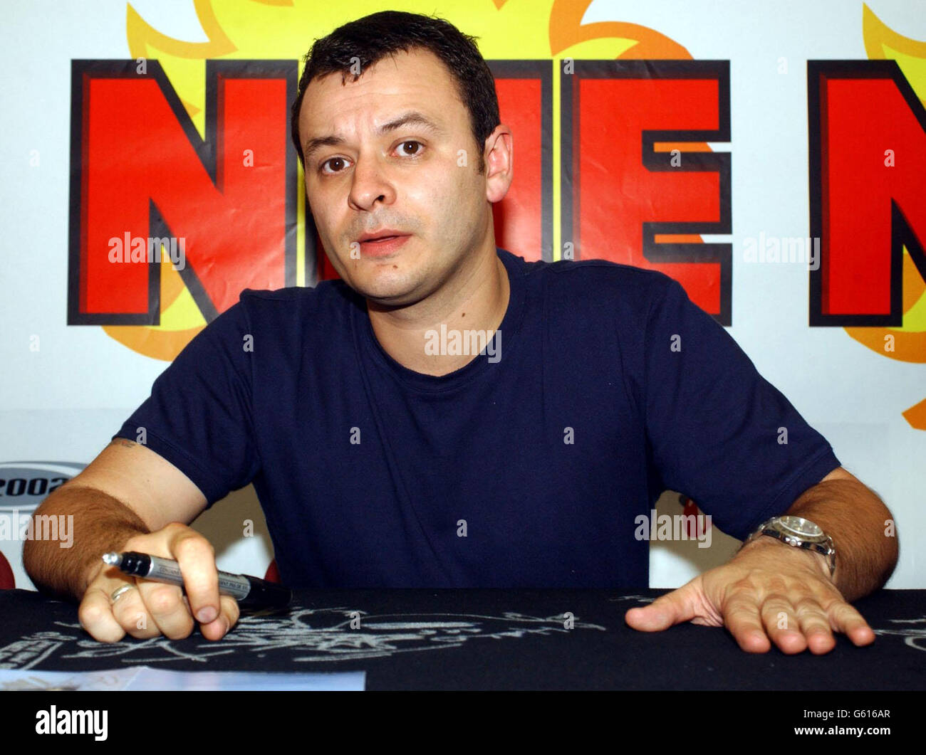 James Dean Bradfield, lead singer of the Manic Street Preachers, signs ...