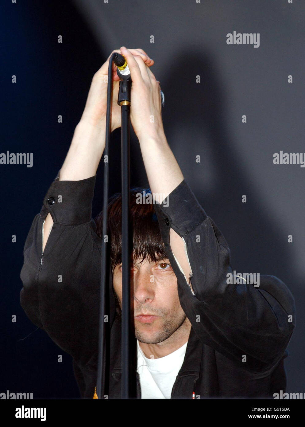 Bobby Gillespie lead singer of Primal Scream, performing on the V Stage ...