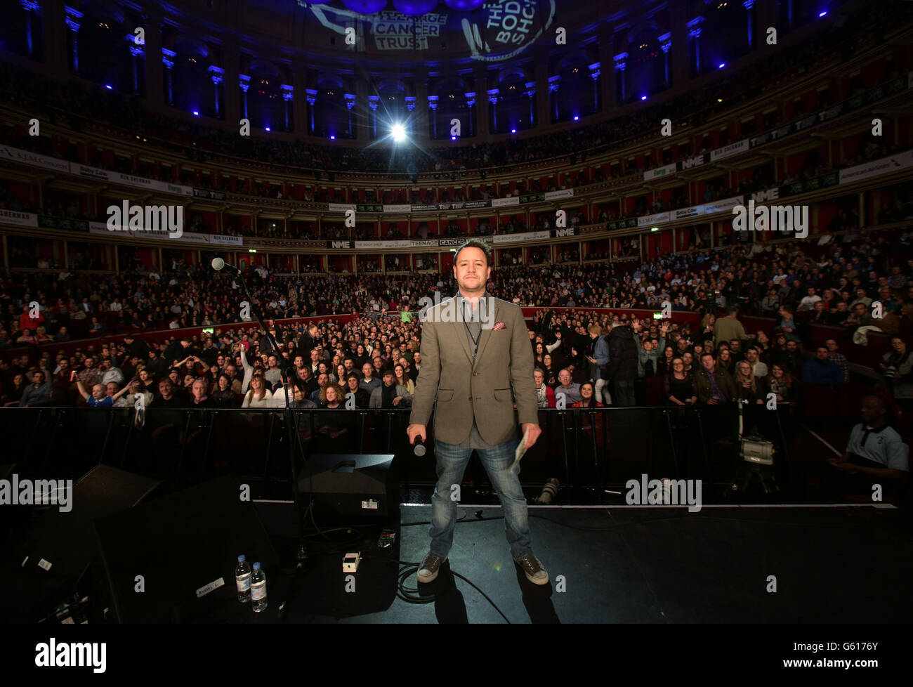 Teenage Cancer Trust concert - London. xfm DJ Jon Holmes on stage ...