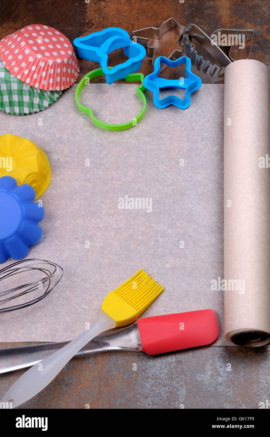 table with blank sheet of paper, baking cake ingredients and cooking ...