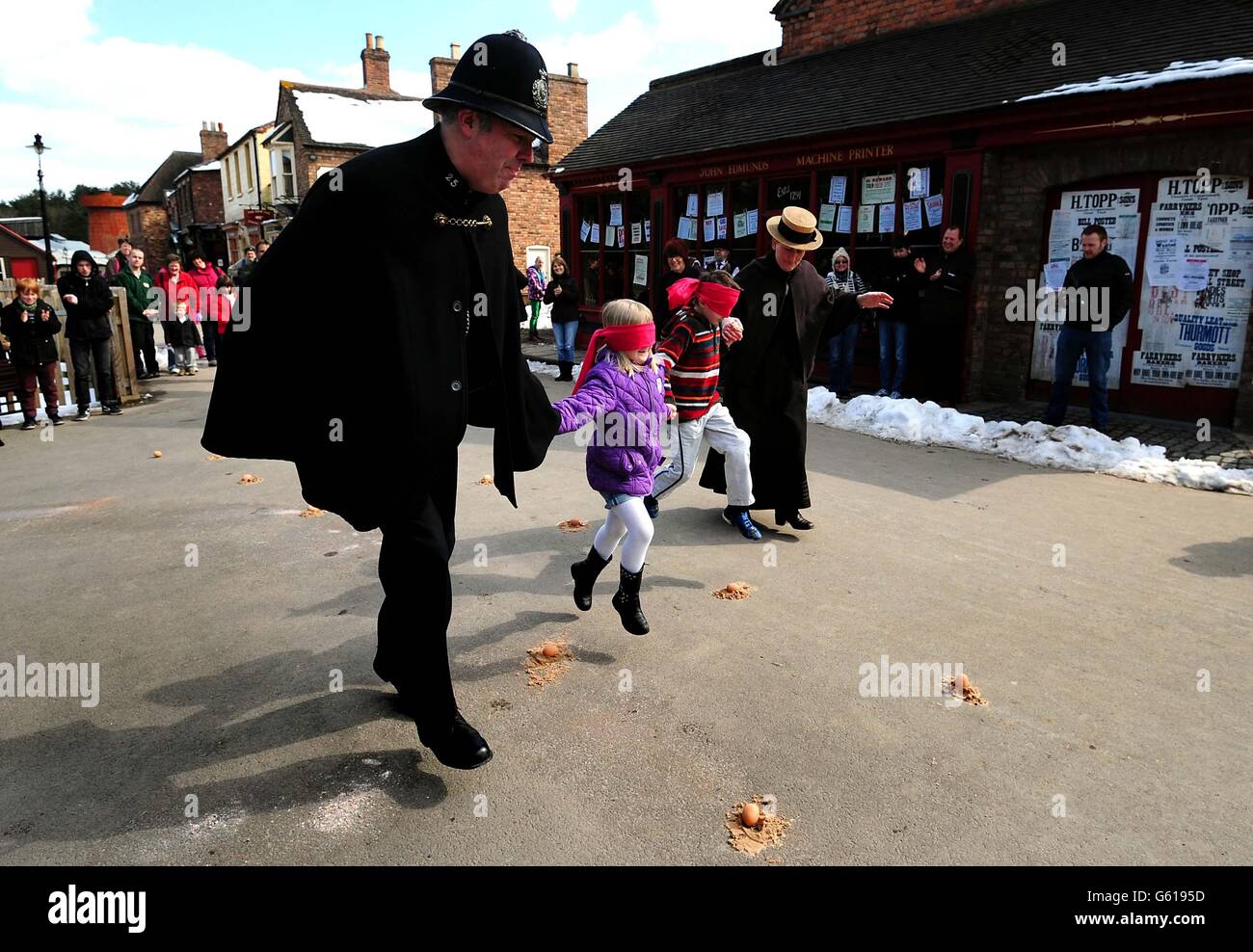 Constable Jarrett and school teacher Miss Burke and visitors, enjoy the ...