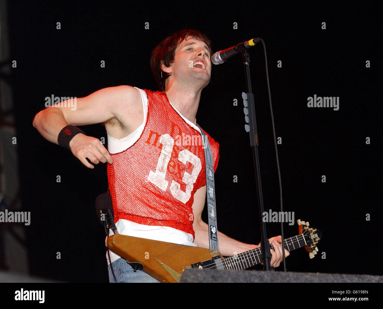 Pop star performing celebrity music on stage singing microphone hi-res ...