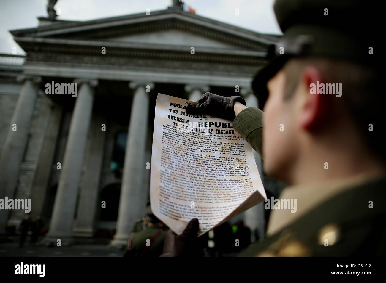 Captain Eoin Rochford from the Irish Defence Forces reads the ...