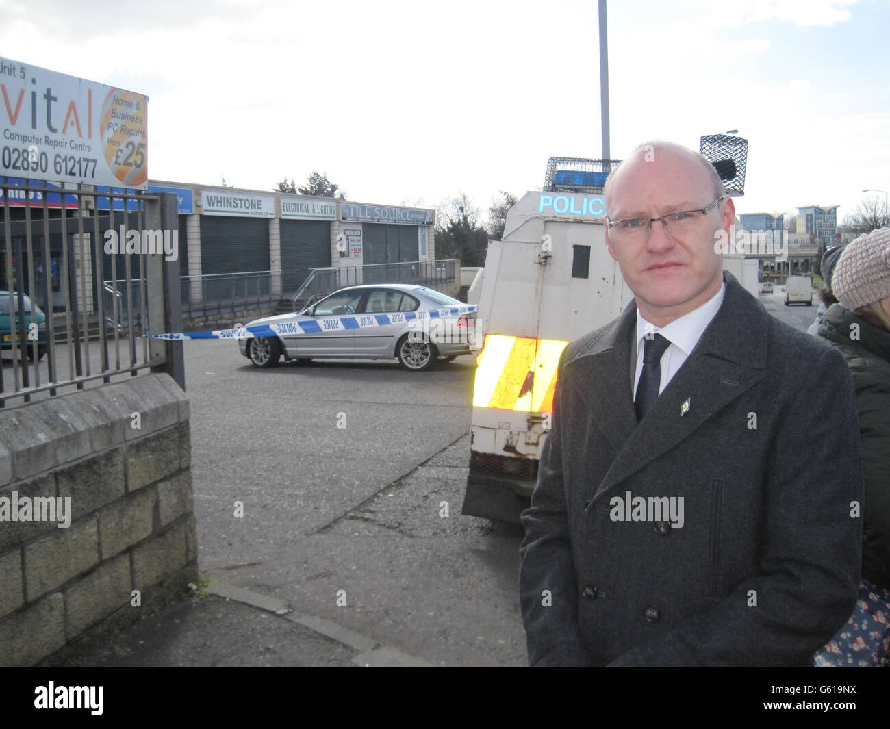 West Belfast MP Paul Maskey outside Domino's Pizza in the Turf Lodge ...