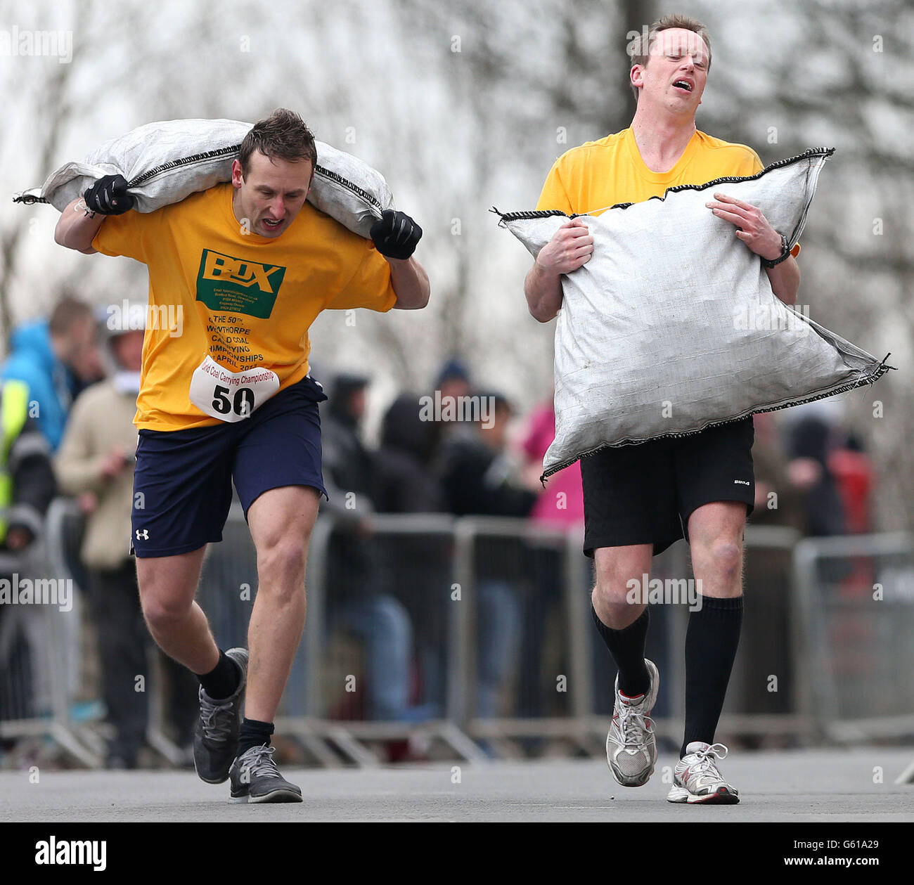 Competitors struggle towards the finish line during the 50th World Coal ...