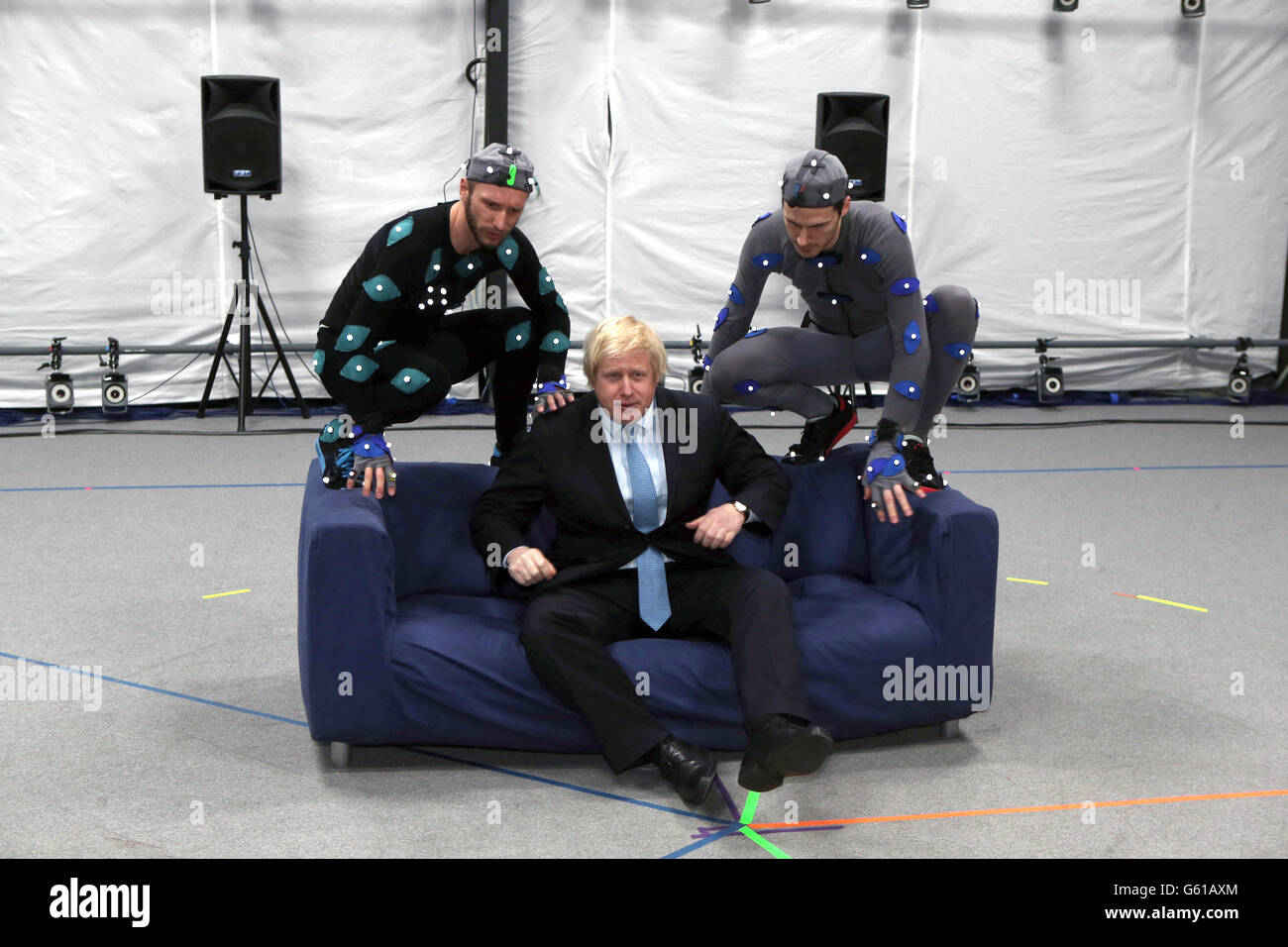 Mayor of London Boris Johnson with actor Matt Cross (L) and Dawson James as he visits ...