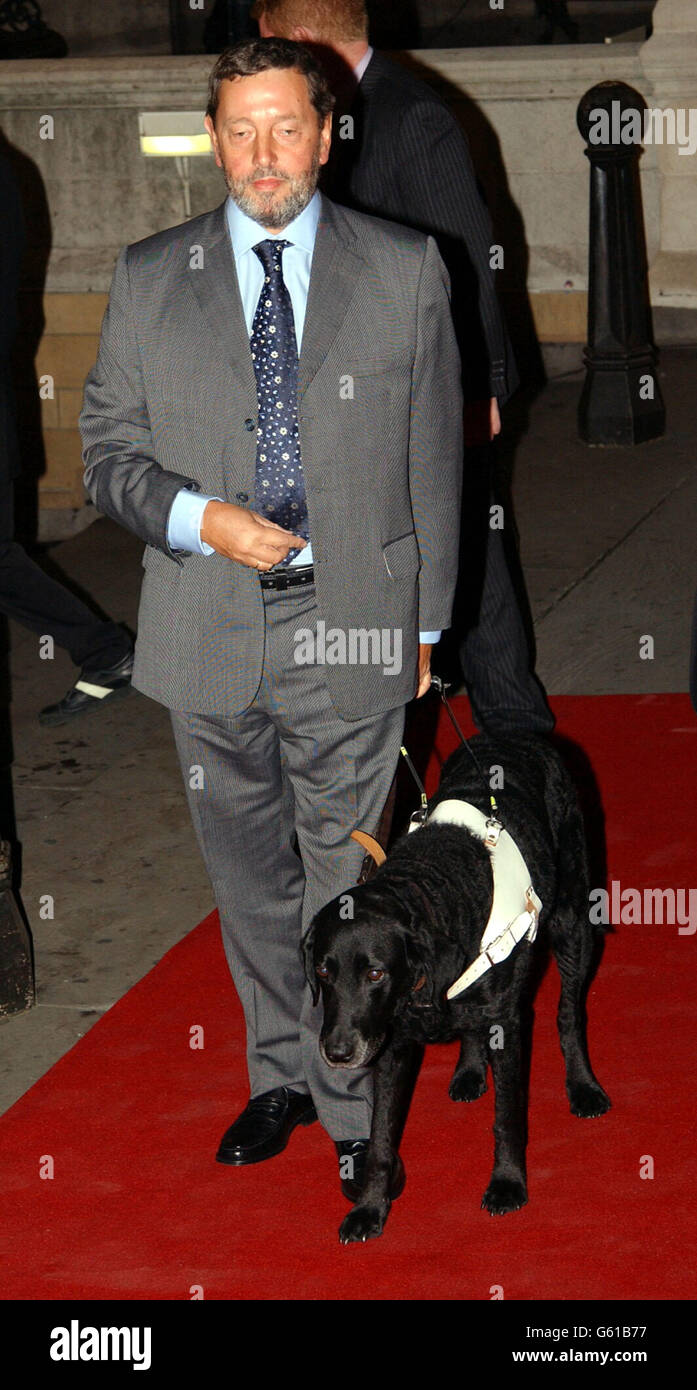 Home secretary david blunkett with his guide dog lucy hi-res stock ...