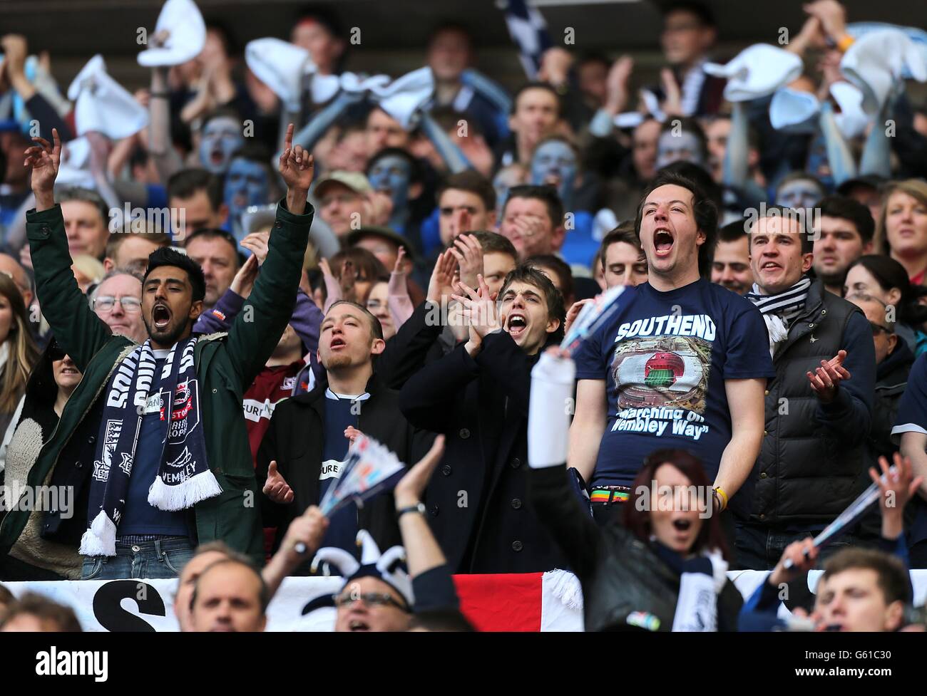 Crewe alexandra fans cheer on their side in the stands hi-res stock ...